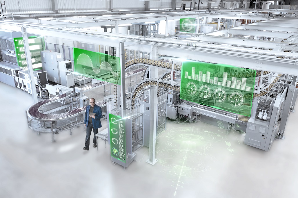 High angle view of printing press conveyor belts in printing plant ...